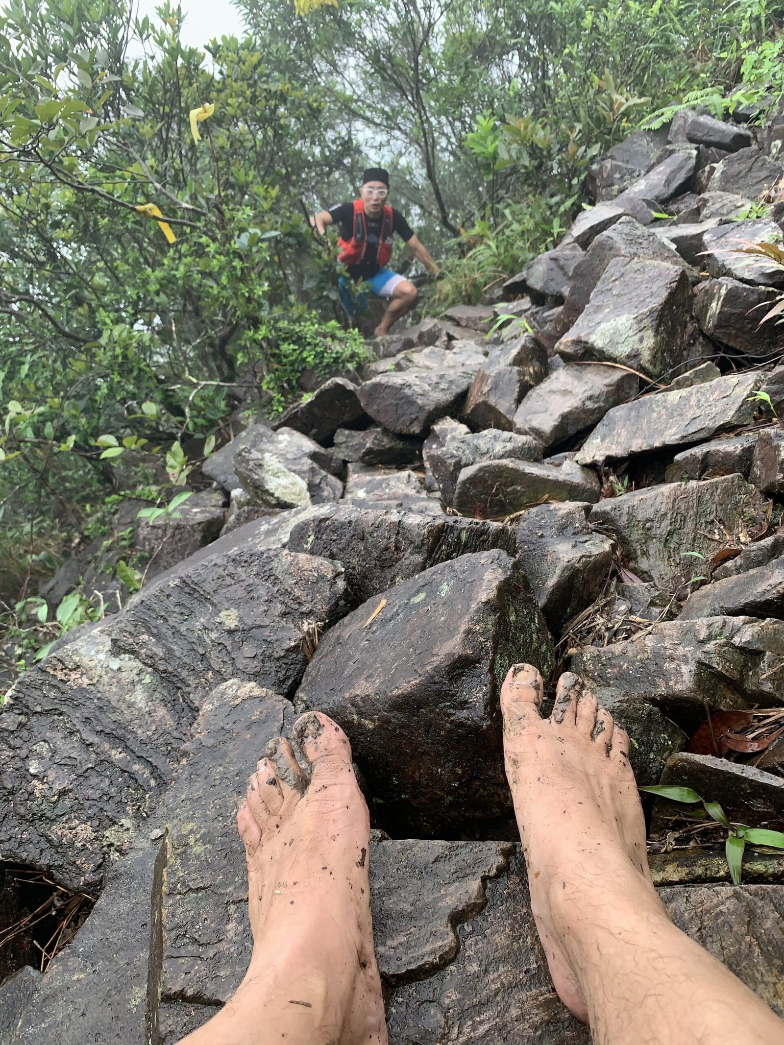 In the storm: barefoot hike on a mountain during a thunderstorm ...